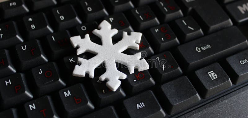 3D Printed Snowflake Lies on Black Desktop Keyboard Stock Image - Image ...