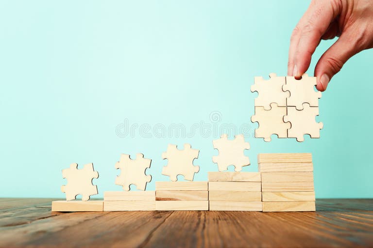 Concept Image of Hand Holding Puzzle Pieces. Idea of Success and ...