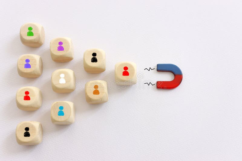 Concept Image of a Magnet Attracting a Group of People. Metaphor of ...