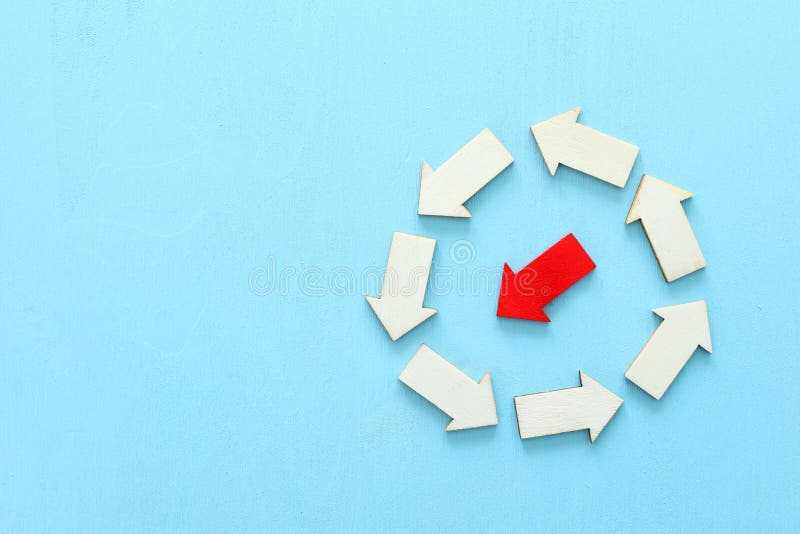 Concept Image of Red Arrow Facing Opposite Direction from Other Arrows ...