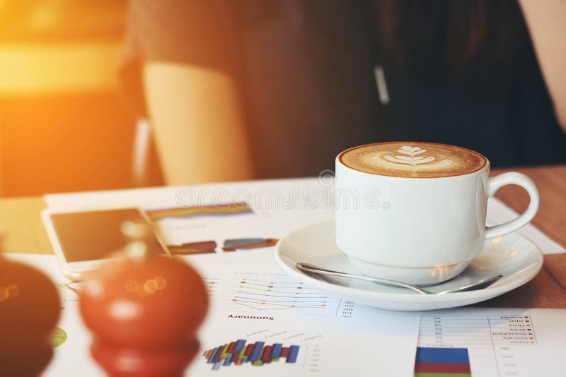 Concept Image of Served Latte Art Coffee during Checked Summary Graph ...