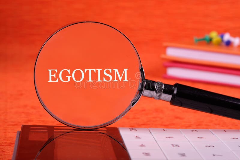 Concept Image. the Word EGOTISM through a Magnifying Glass Standing ...