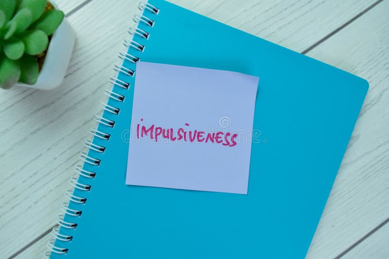 Concept of Impulsiveness Write on Sticky Notes Isolated on Wooden Table ...