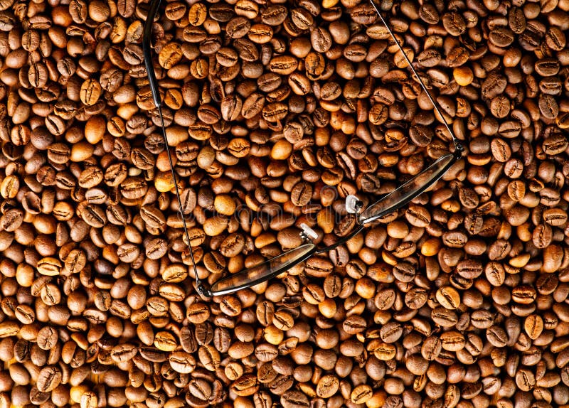 The Concept of Intellectual Work. Coffee Beans and Glasses on Them ...