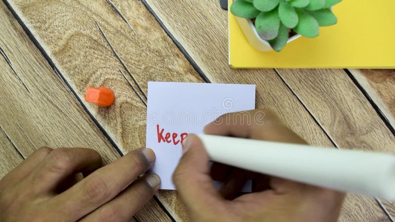 Concept of Keep Going Write on Sticky Notes Isolated on Wooden Table ...