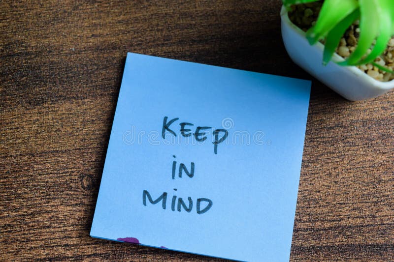 Concept of Keep in Mind Write on Sticky Notes Isolated on Wooden Table ...