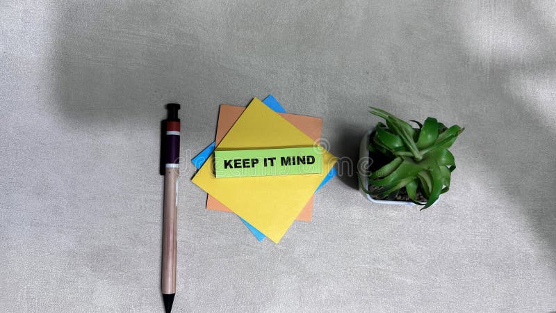 Concept of Keep it Mind Write on Sticky Notes Isolated on Wooden Table ...