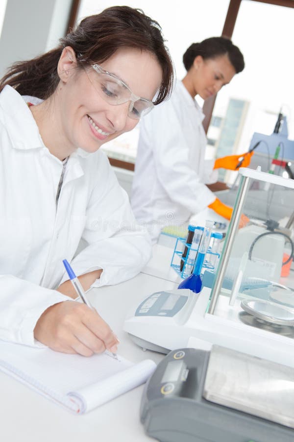 Concept Laboratory Technician Taking Notes Stock Image - Image of ...