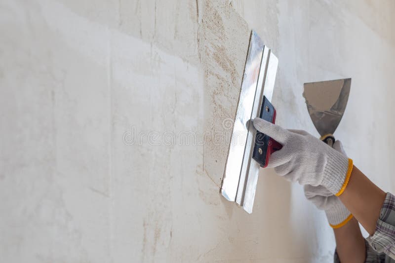 The Concept of Leveling and Plastering a Surface Using a Spatula Stock ...