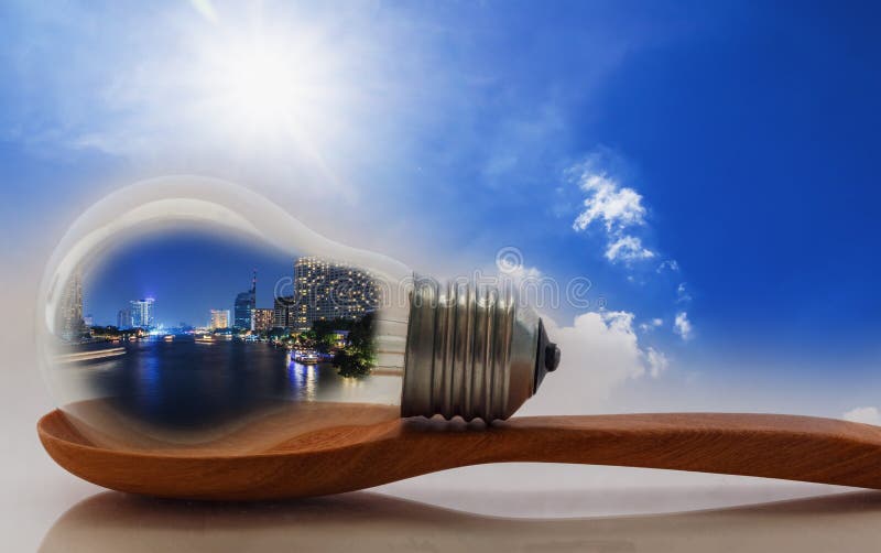 Building on the Light Bulb on Wood Stock Image - Image of concept ...