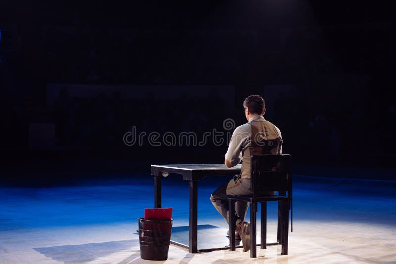 Concept. a Lone Office Worker Sits in a Dark Room Stock Image - Image ...