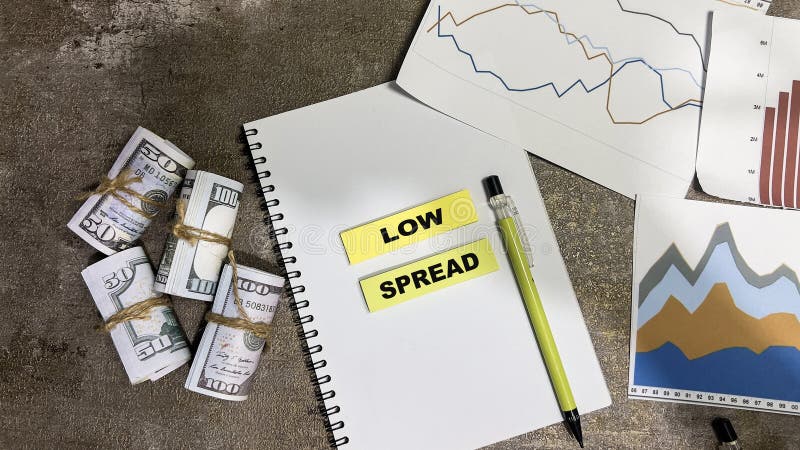 Concept of Low Spread Write on Sticky Notes Isolated on Wooden Table ...