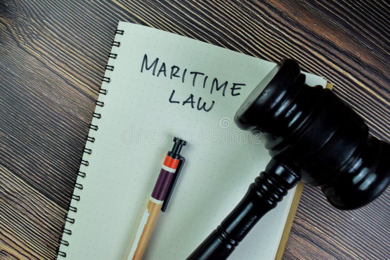 Concept of Maritime Law Write on a Book Gavel Isolated on Wooden Table ...