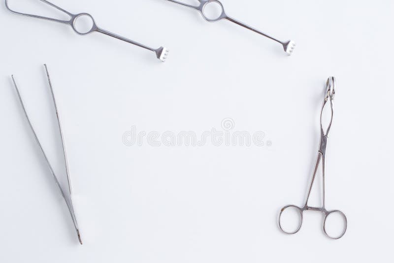 Concept for Medicine. Vintage Surgical Instruments on White Isolated ...
