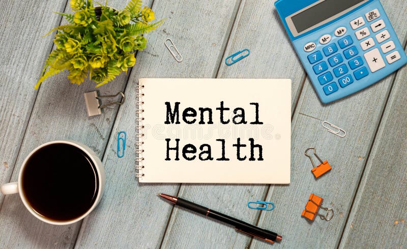 Concept of Mental Health Write on Sticky Notes Isolated on Wooden Table ...