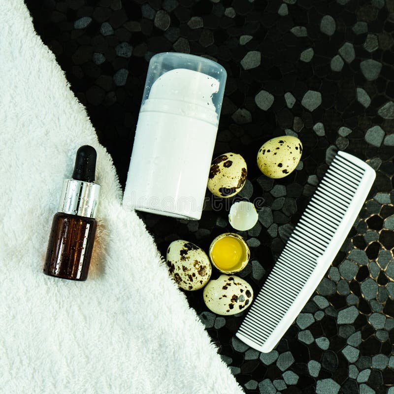 The Concept of Natural Cosmetics Based on Eggs, a Bottle Layout, a Comb ...