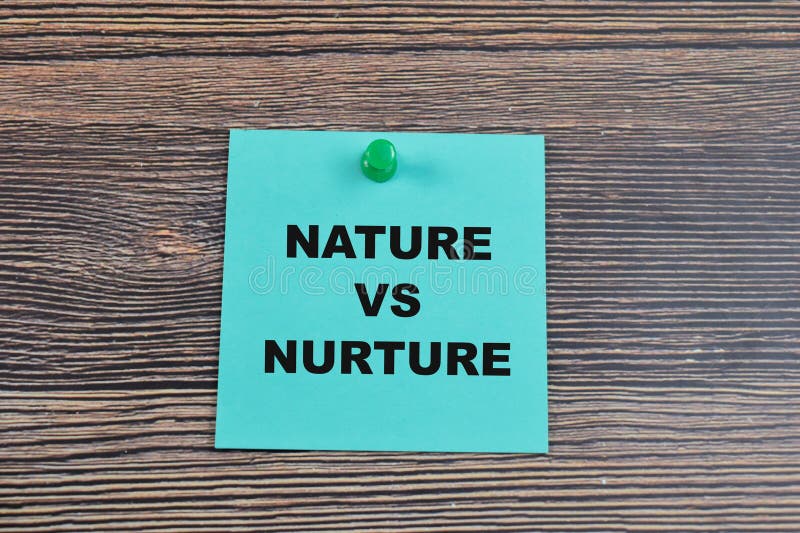 Concept of Nature Vs Nurture Write on Sticky Notes Isolated on Wooden ...