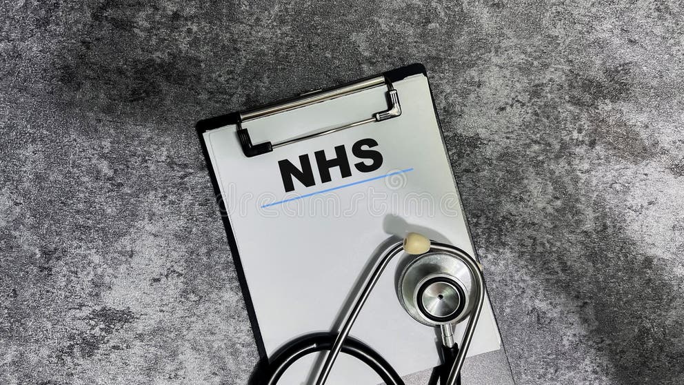 Concept of NHS Write on Paperwork Isolated on Wooden Background Stock ...