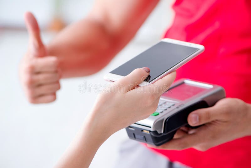 The Concept of Paying with Pos Terminal Stock Photo - Image of present ...