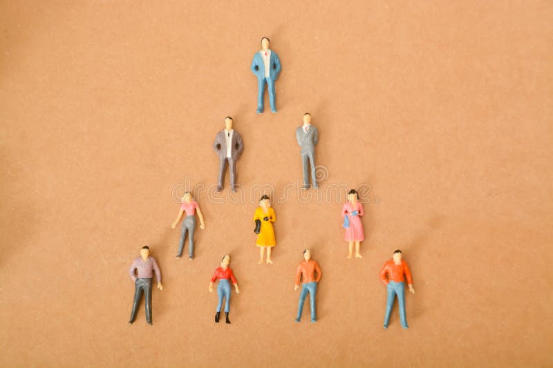 The Concept of People Forming a Team in a Pyramid Shape Reflects the ...