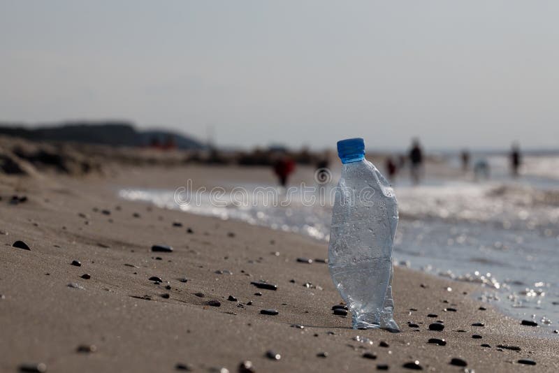 The Concept of People Littering the Environment on the Beach. Abandoned ...