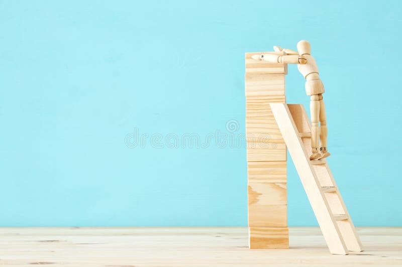 Concept Photo of Obstacles Overcoming, Wooden Dummy Looking at a ...