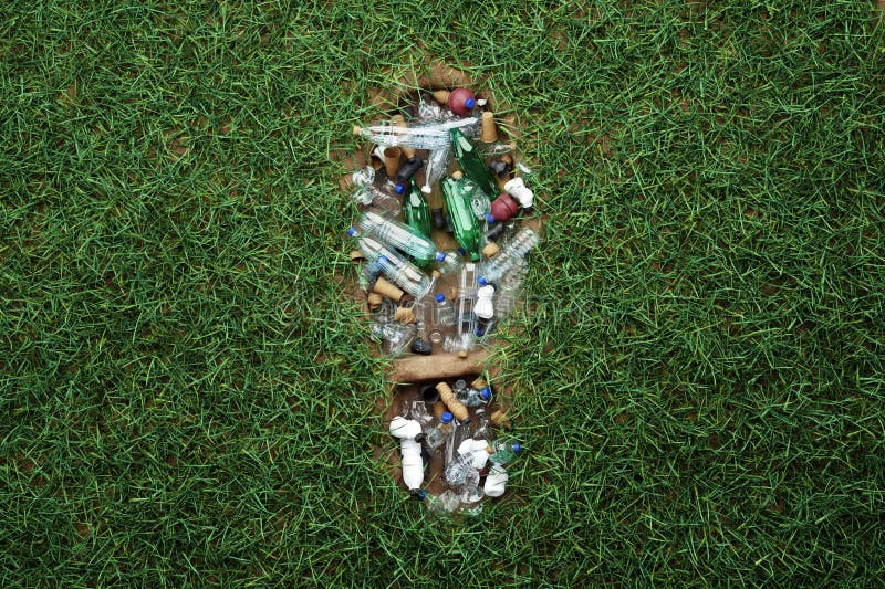 Concept Plastic Pollution, Human Footprint in Green Grass Filled with ...