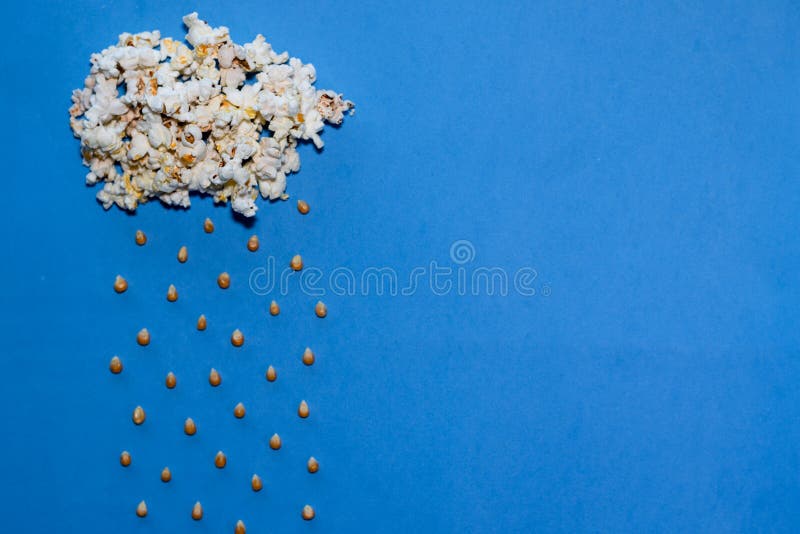 Rain Of Popcorn Falling Inside A Can Or Tin, Isolated On Light Green ...