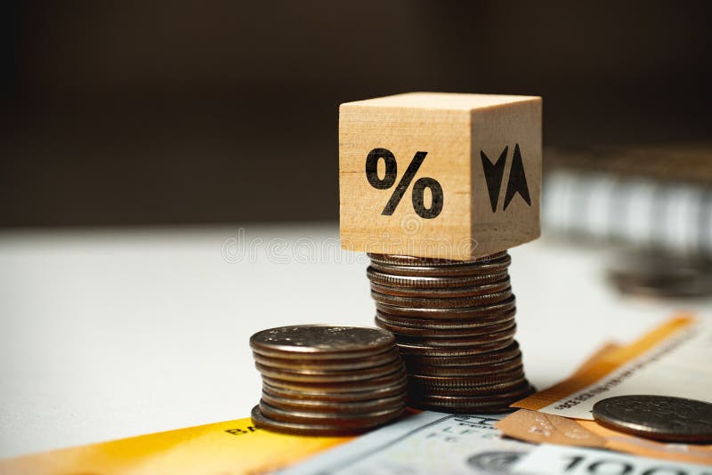 The Concept of Raising and Lowering the Interest Rate. Cube on a Stack ...