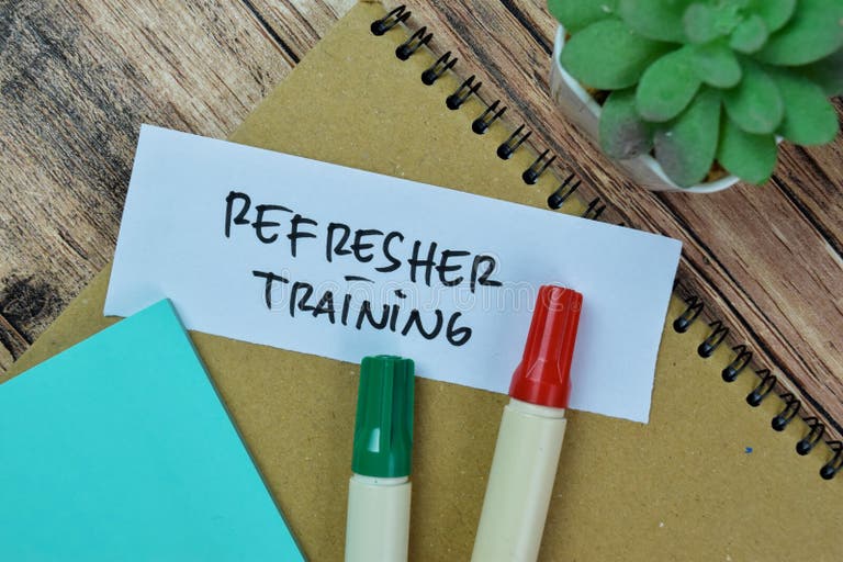 Concept of Refresher Training Write on Sticky Notes Isolated on Wooden ...