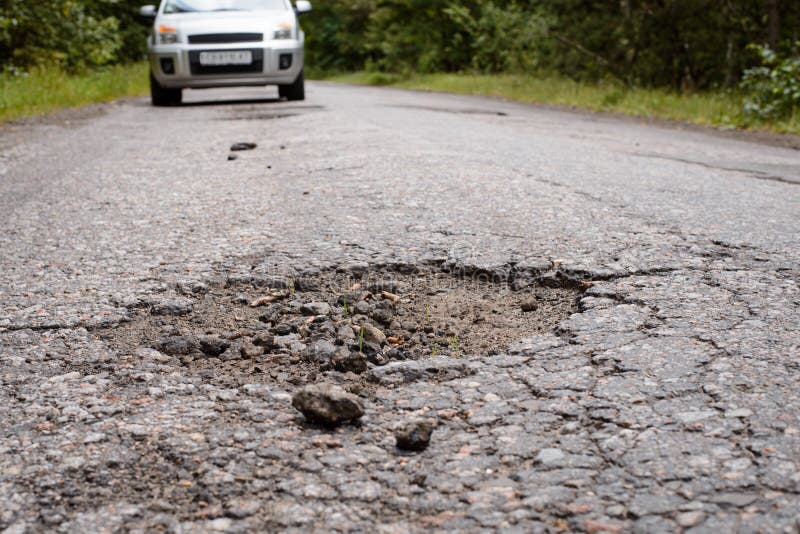 Road in terrible condition stock photo. Image of street - 259710908