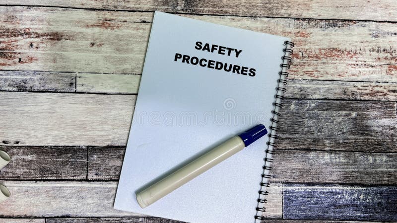Concept of Safety Procedures Write on Book Isolated on Wooden Table ...