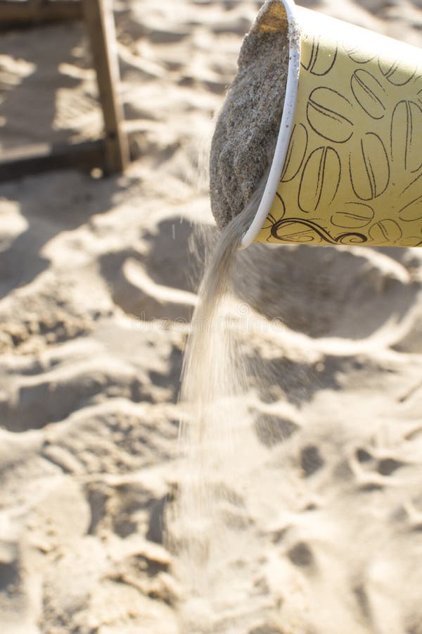 Concept with Sand and Paper Cup on the Beach Stock Photo - Image of ...