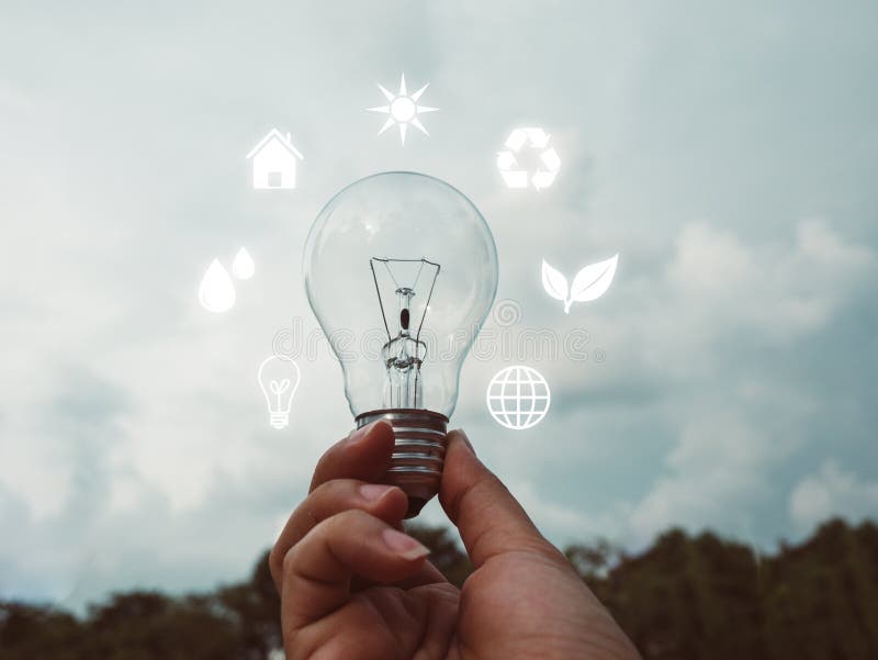 Concept Save Energy Efficiency. Hand Holding Light Bulb with Icon on ... Concept Save Energy Efficiency. Hand Holding Light Bulb with Icon on ...