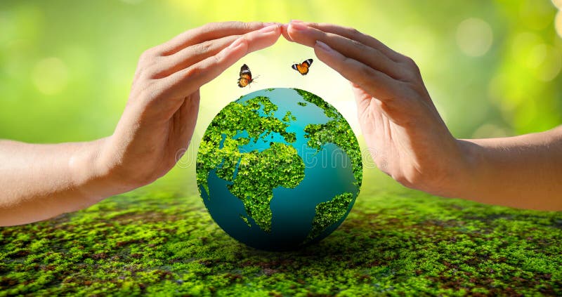 Concept Save the World Save Environment the World is in the Grass of ...