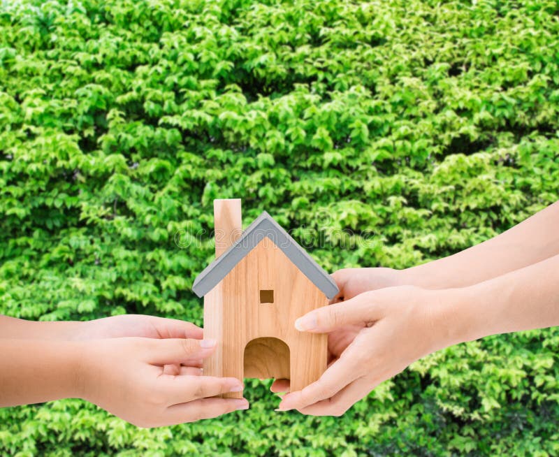 The Concept of Saving Hand that Holds the House Stock Photo - Image of ...