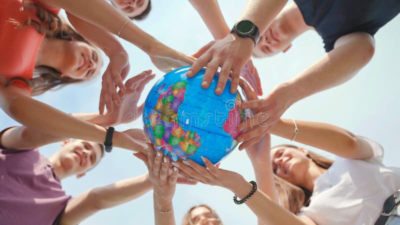 The Concept of Saving the World. a Group of Friends Hold the World ...