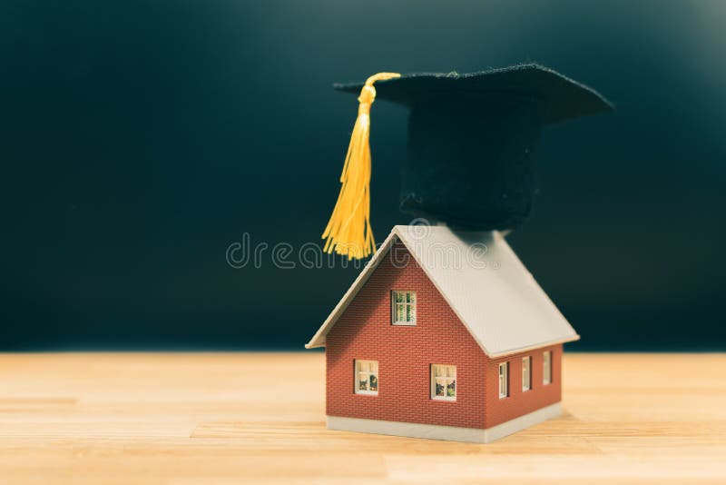 Concept for a Smart Home. a Model House Wears a Graduation Hat Stock ...