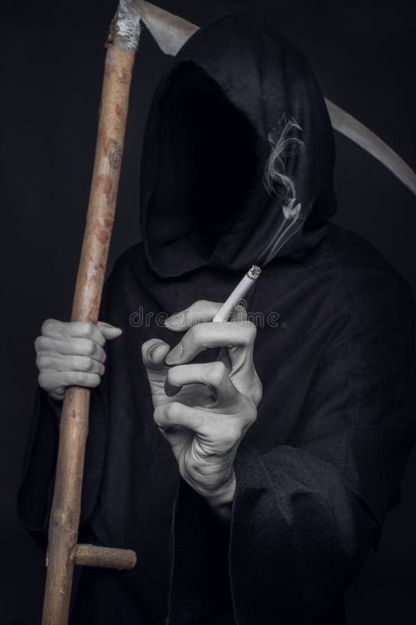 The Concept: Smoking Kills. Grim Reaper Holding Cigarette Stock Photo ...