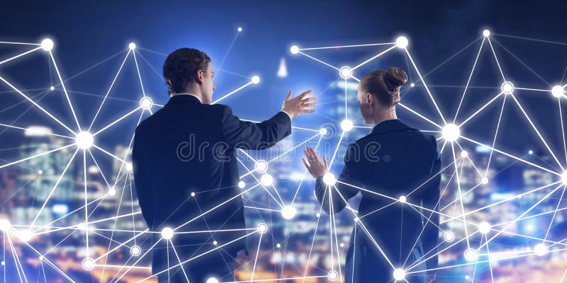 Concept Of Social Connection And Networking Against Night City View And Partners Working In