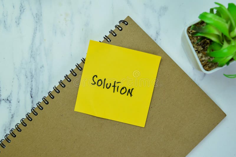 Concept of Solution Write on Book Isolated on Wooden Table Stock Image ...