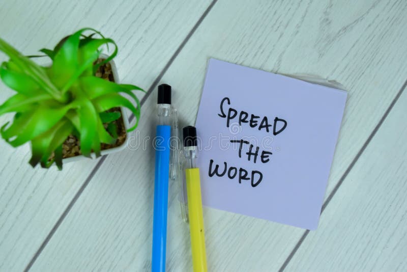 Concept of Spread the Word Write on Sticky Notes Isolated on Wooden ...