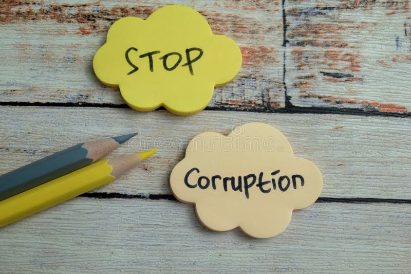 Concept of Stop Corruption Write on Sticky Notes Isolated on Wooden ...