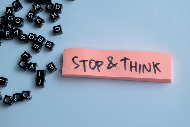 Concept of Stop and Think Write on Sticky Notes Isolated on Wooden ...