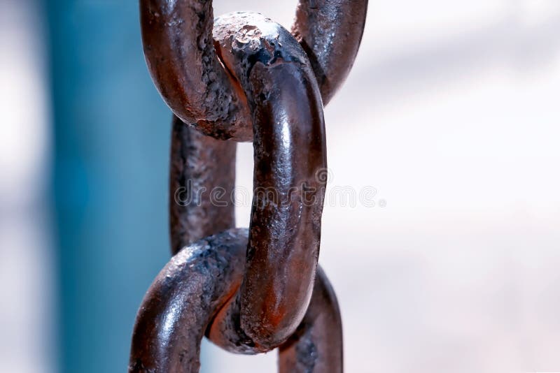 Fastening the Chain with a Large Bolt. at the End of the Chain is an ...