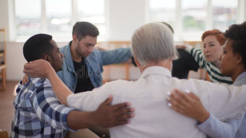 Selective Focus of Sad Young Man Sharing Problem in Support Group and ...