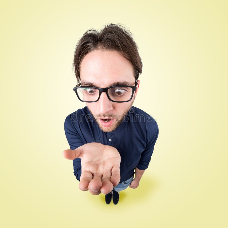 Concept Of A Surprised Happy Young Man Holding Something With Hi Stock ... Concept Of A Surprised Happy Young Man Holding Something With Hi Stock ...