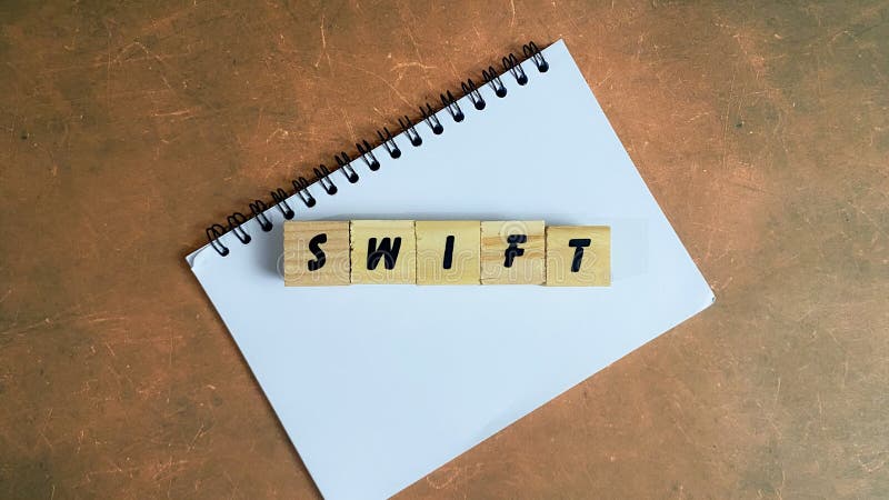 Concept of Swift Writing on Wooden Cube Isolated on Work Desk. Stock ...