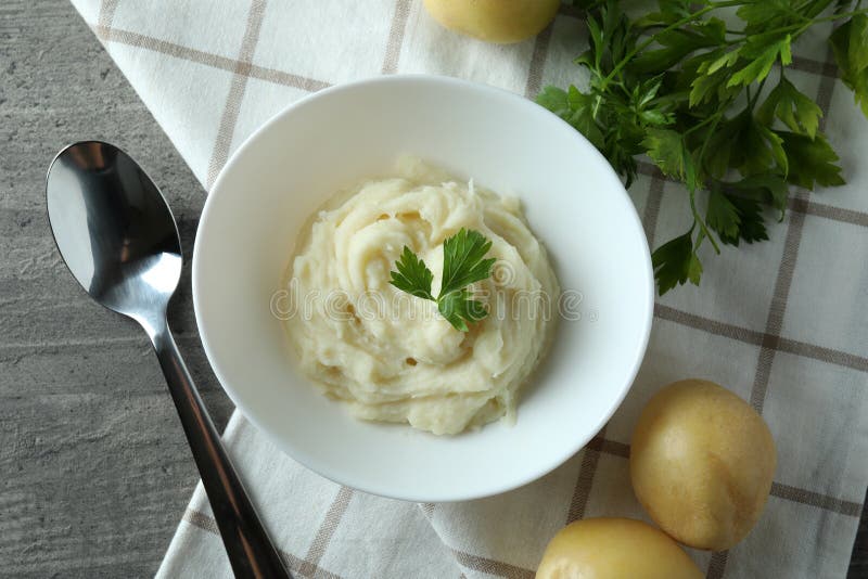 Concept of Tasty Eating with Mashed Potatoes on Gray Textured Table ...