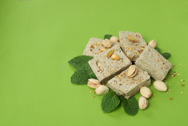 Concept of Tasty Food with Halva on Green Background Stock Photo ...